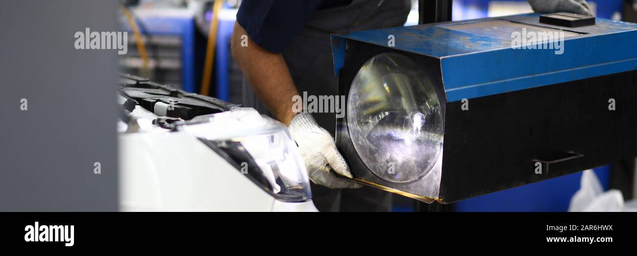 Lightbulb spotlight check Stock Photo - Alamy