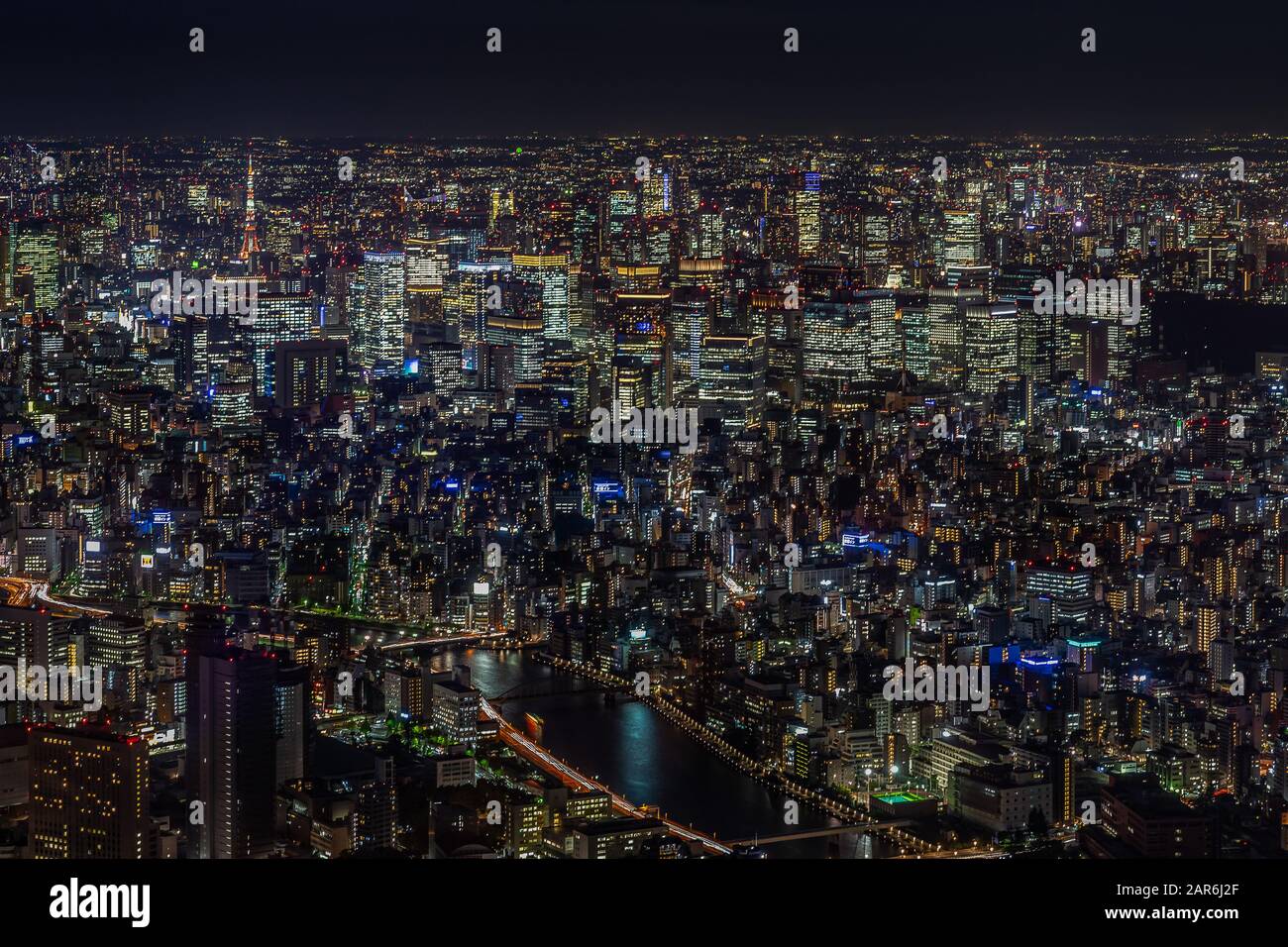 Scenic view of Tokyo skyscraper sand buildings illuminated at night ...