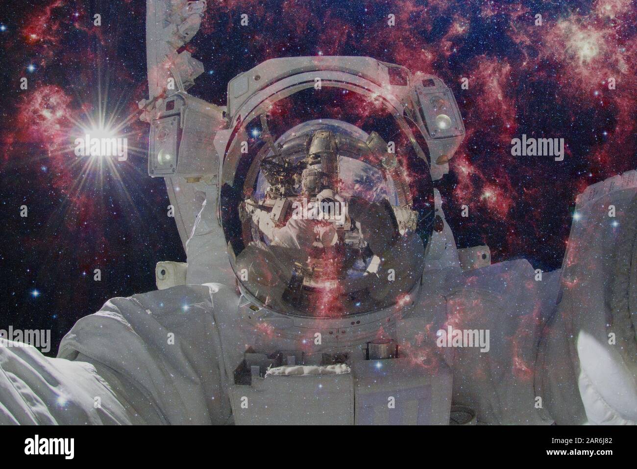 Astronaut in outer space. Science fiction art. Elements of this image ...
