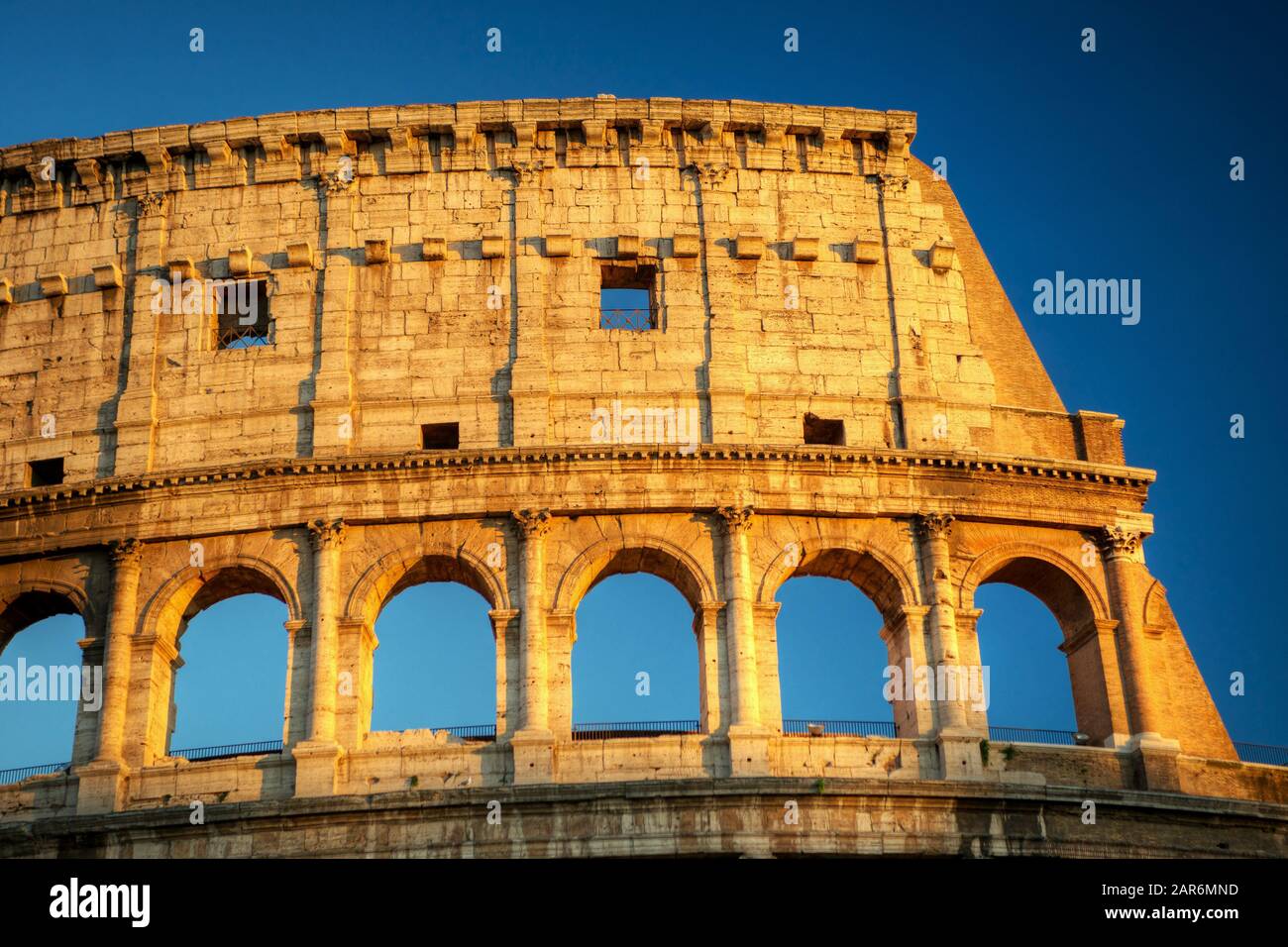 Colosseum (Coliseum) at sunset, Rome, Italy. It is the main tourist ...
