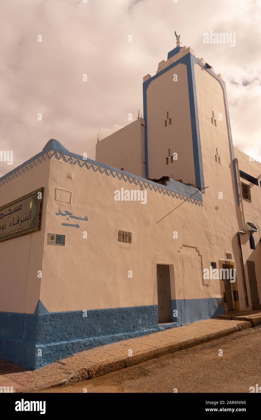 a small mosque, painted blue and white in a street in Tan Tan in the ...