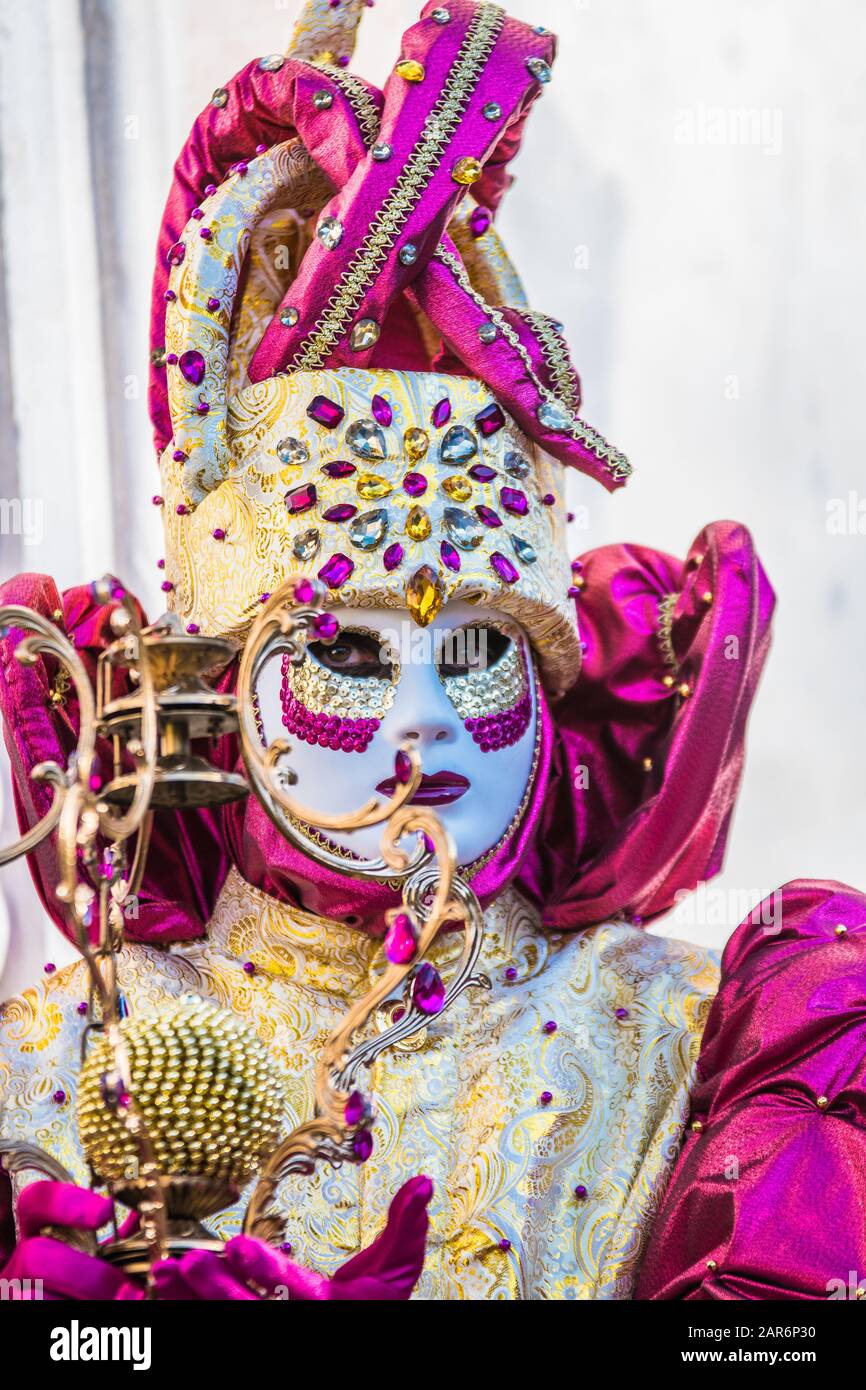 imaginative mask in splendid costume at the carnival in Venice. The ...