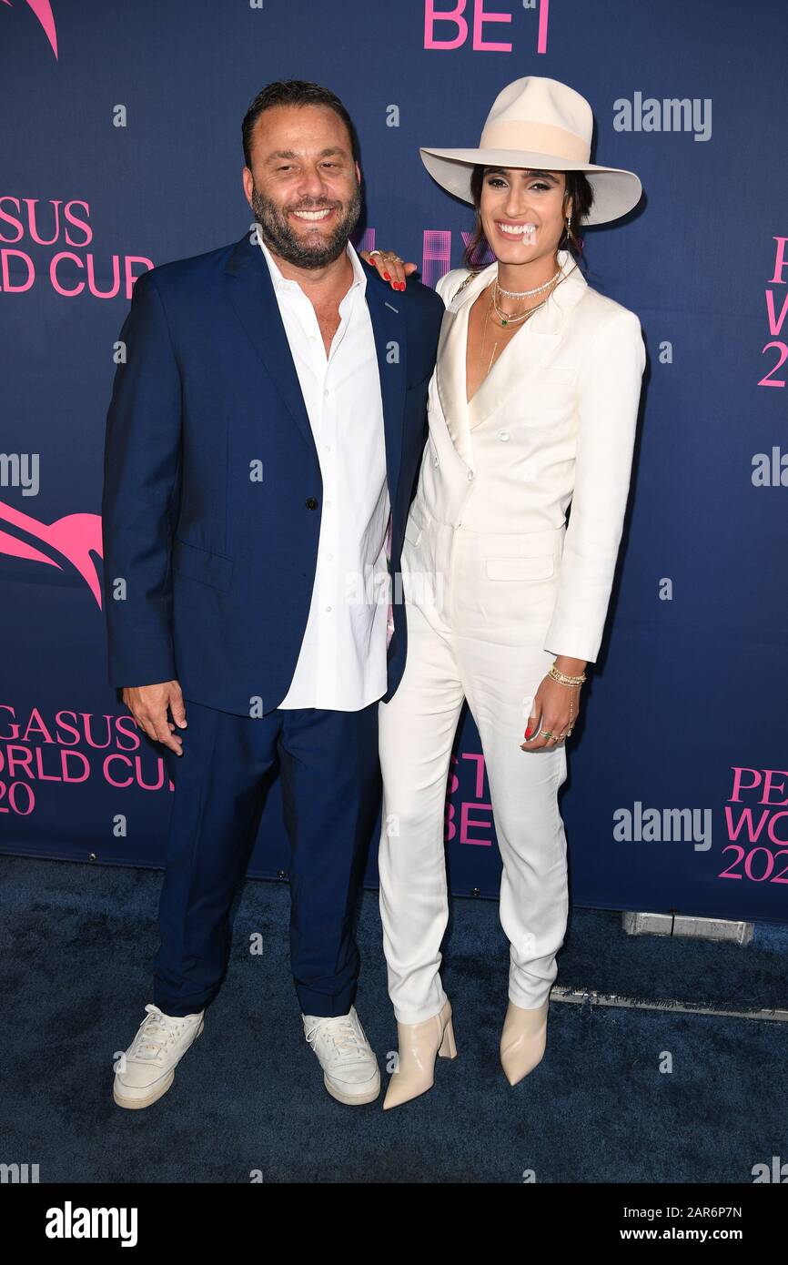 HALLANDALE BEACH FL - JANUARY 25: Dave Grutman and Isabela Rangel ...