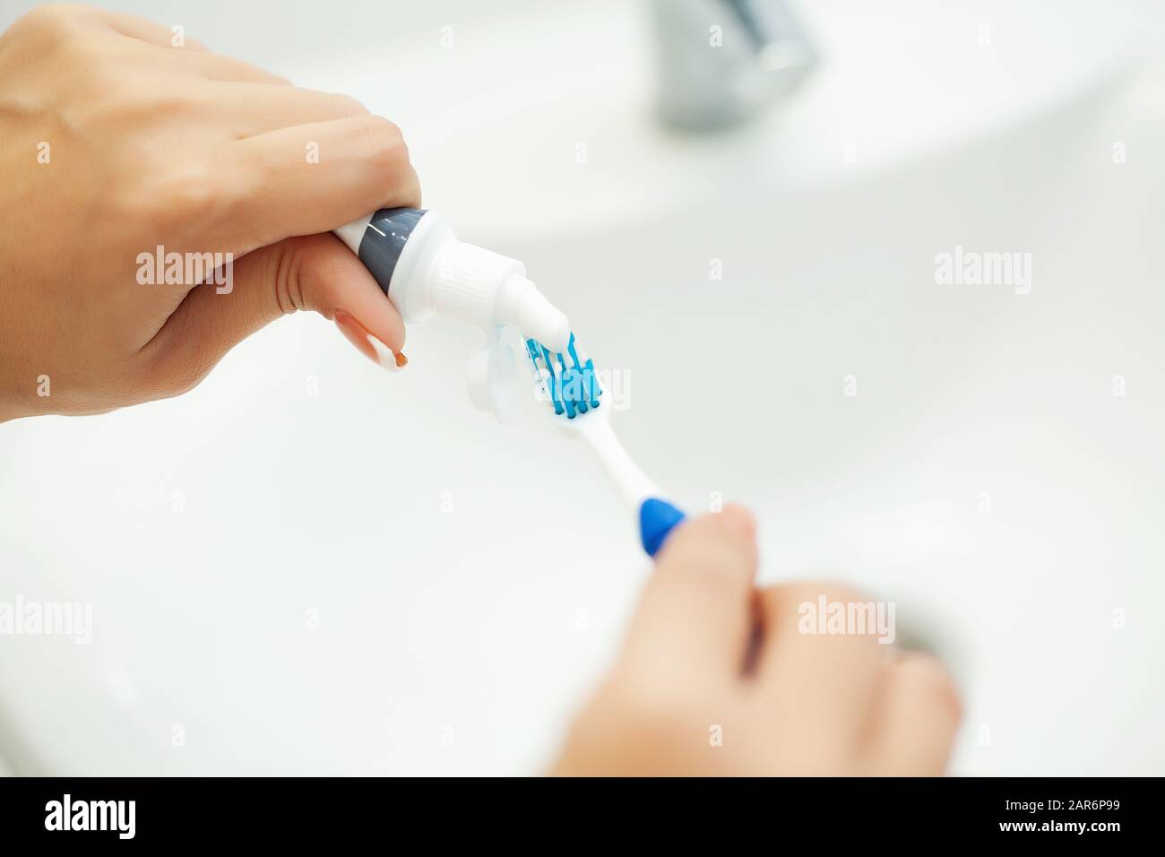 Brushing teeth tap running hi-res stock photography and images - Alamy