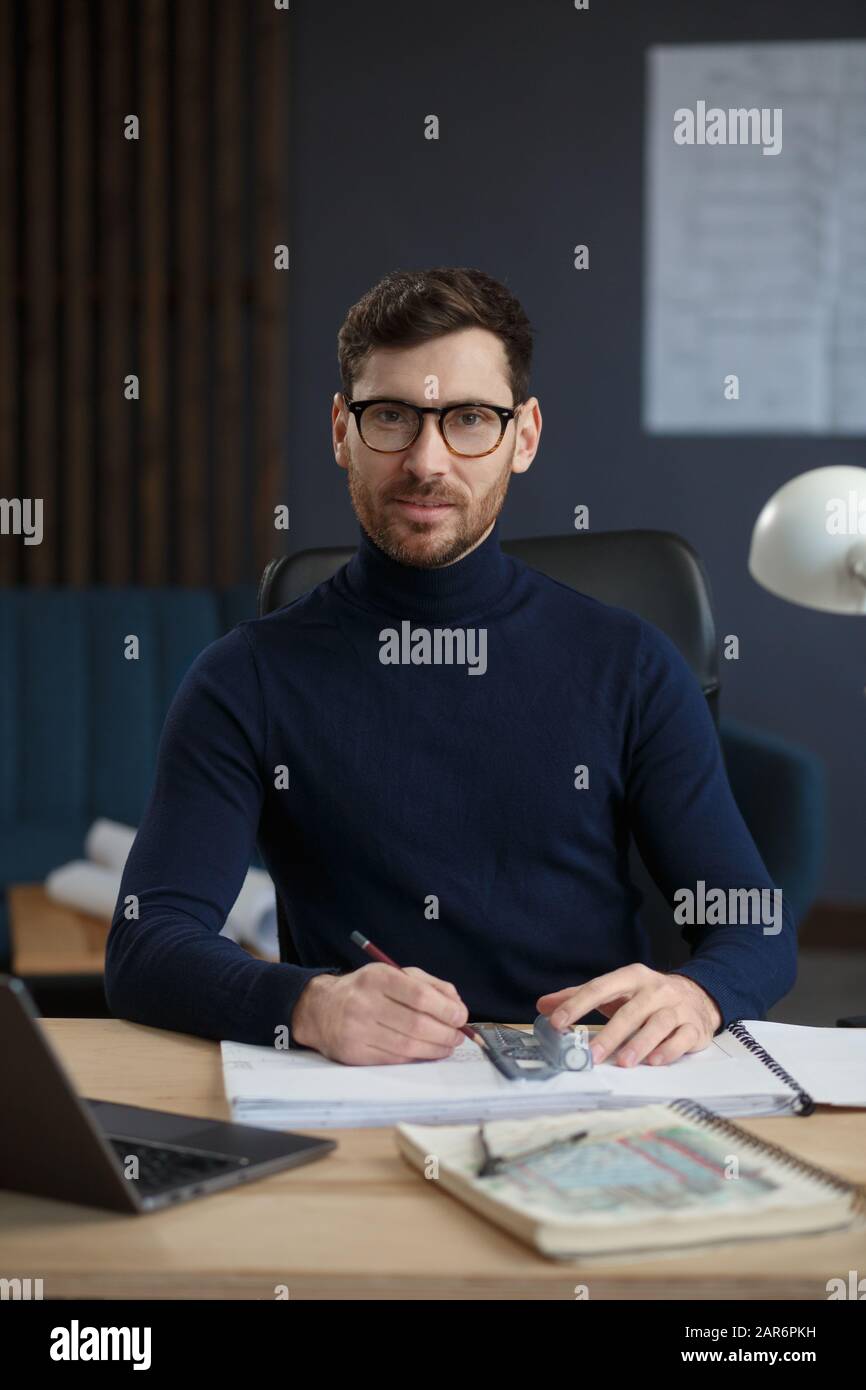 Architect Working In Office With Blueprintsengineer Inspect Architectural Plan Sketching A