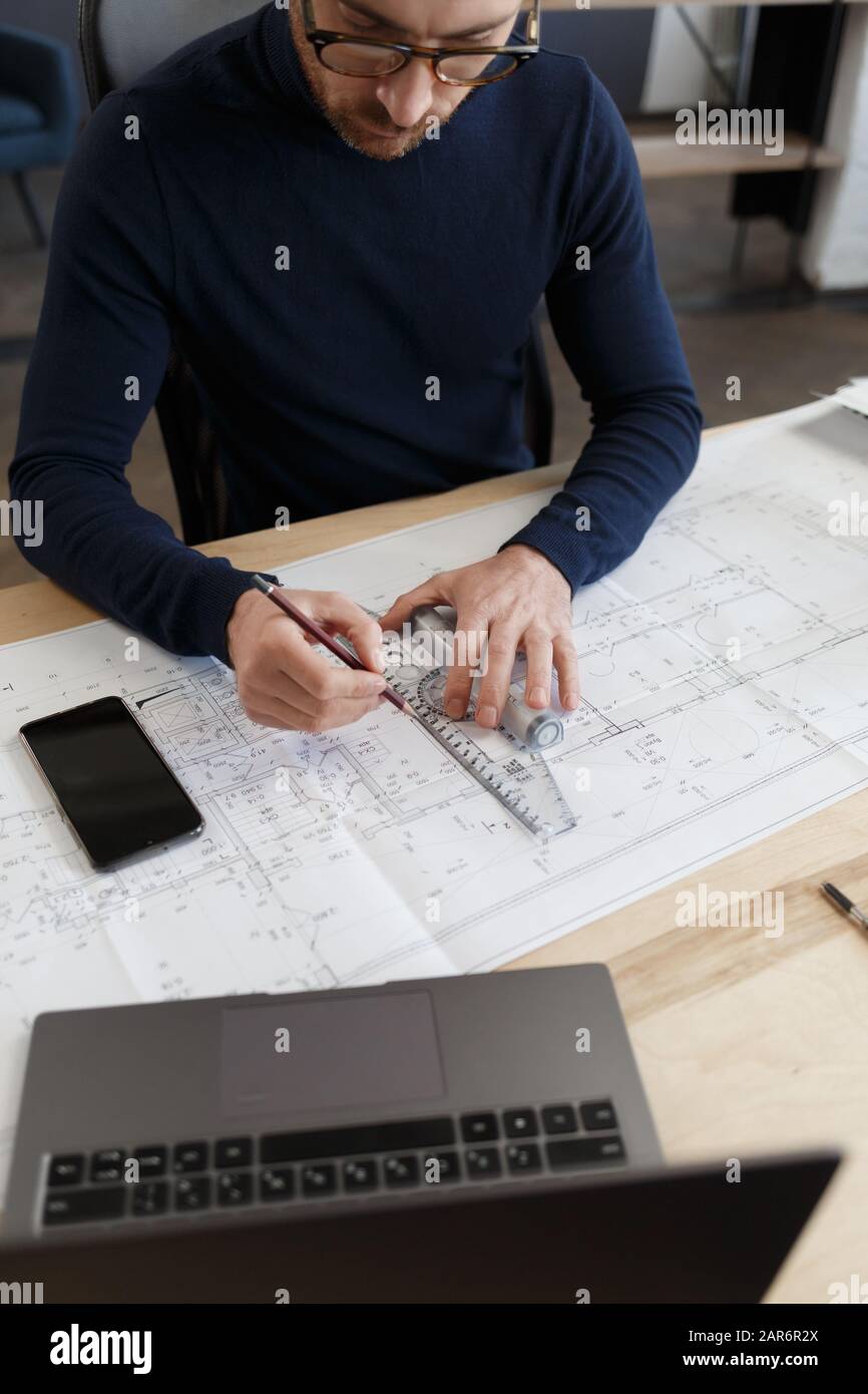 Architect Working In Office With Blueprintsengineer Inspect Architectural Plan Sketching A