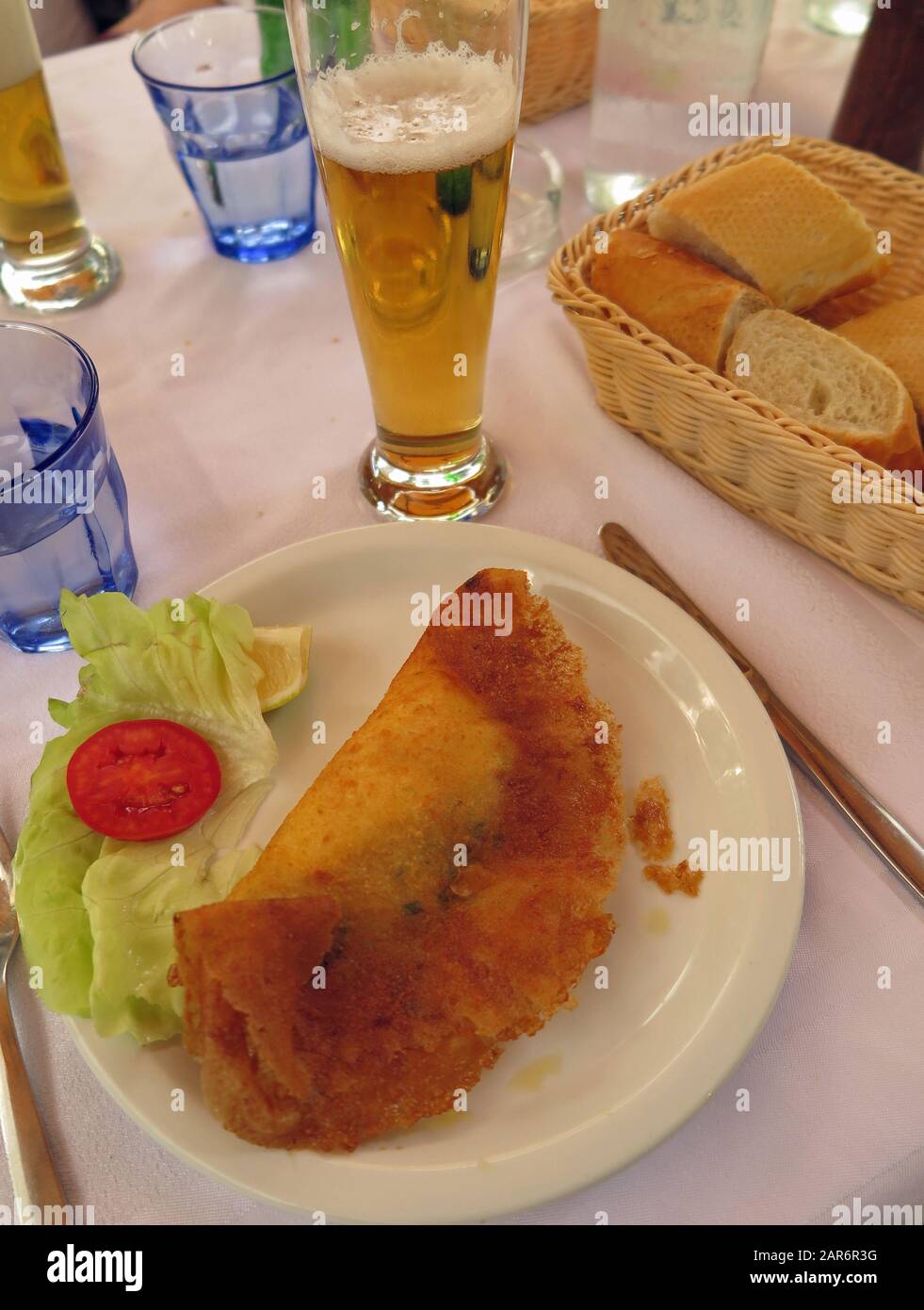 Brik, a typical Tunisian traditional food. Stuffed with egg and usually ...