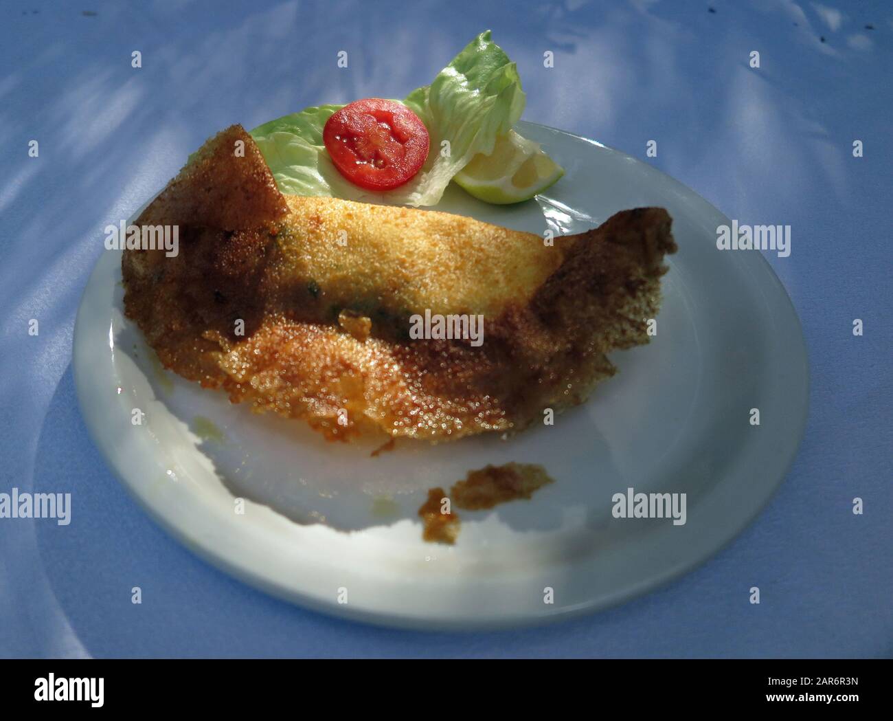 Brik, a typical Tunisian traditional food. Stuffed with egg and usually ...