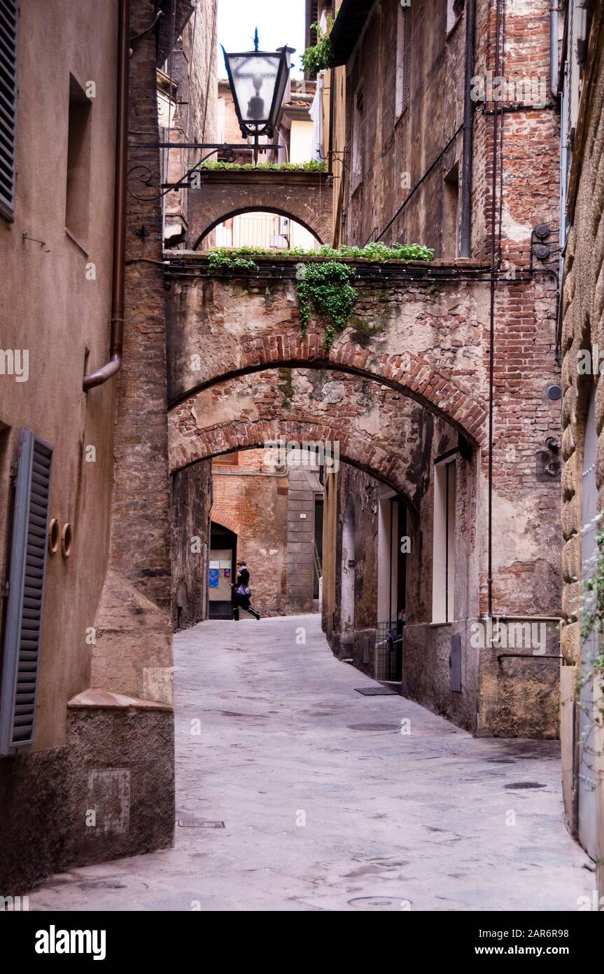 Know for its red brick, the arches of Siena are a delight to the ...