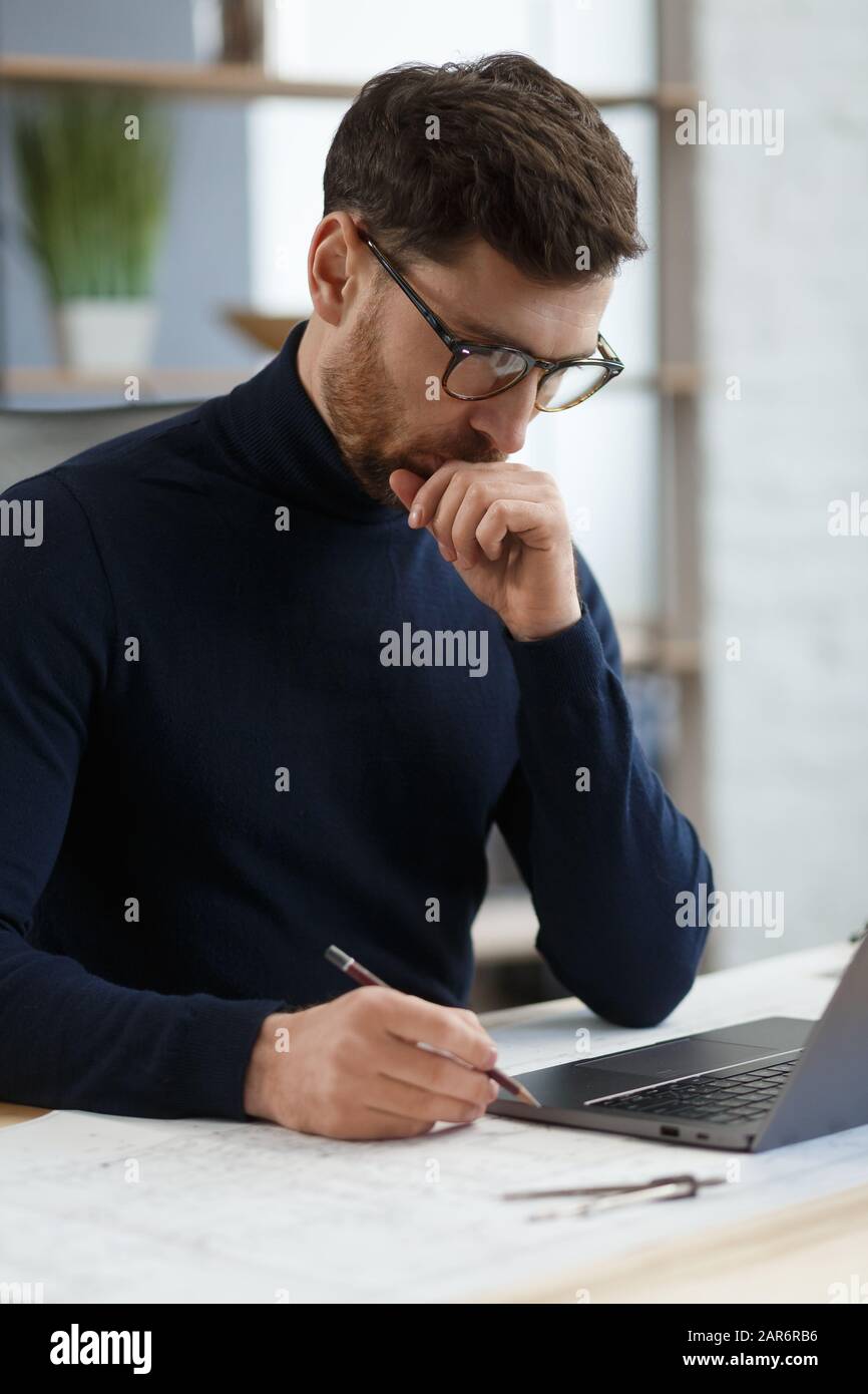 Architect Working In Office With Blueprintsengineer Inspect Architectural Plan Sketching A