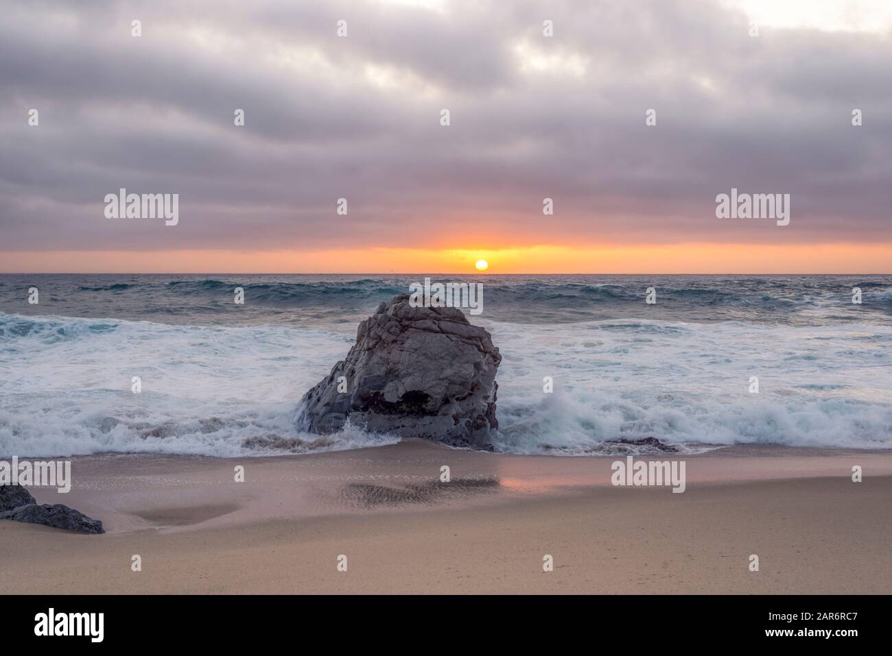 The Sun setting with a view from Garrapata State Beach. Monterey Coast ...