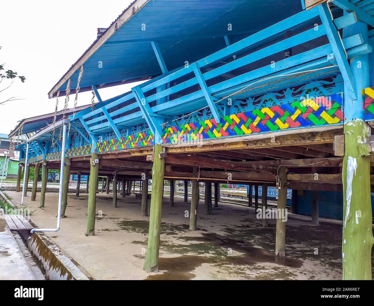 Dayak Lundayeh traditional house with tribal painting. Dayak is native ...