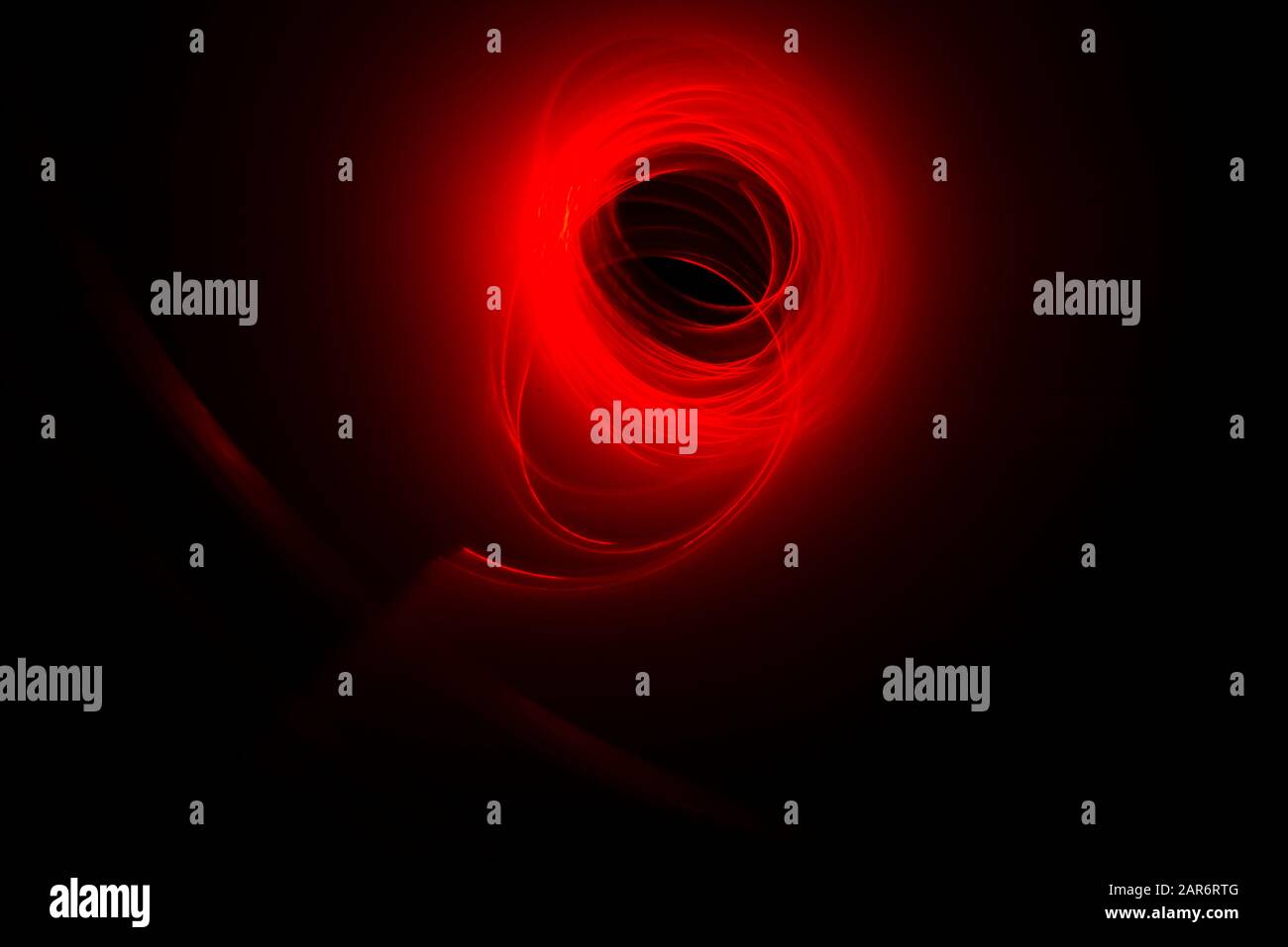 Abstract background with red color light painting Stock Photo - Alamy