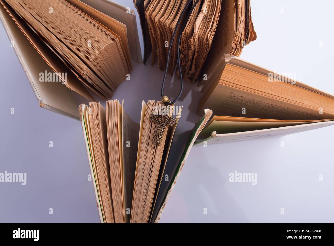 Religious books standing vertically, top view Stock Photo - Alamy