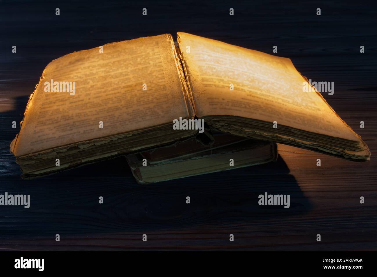 Very old opened book Stock Photo - Alamy