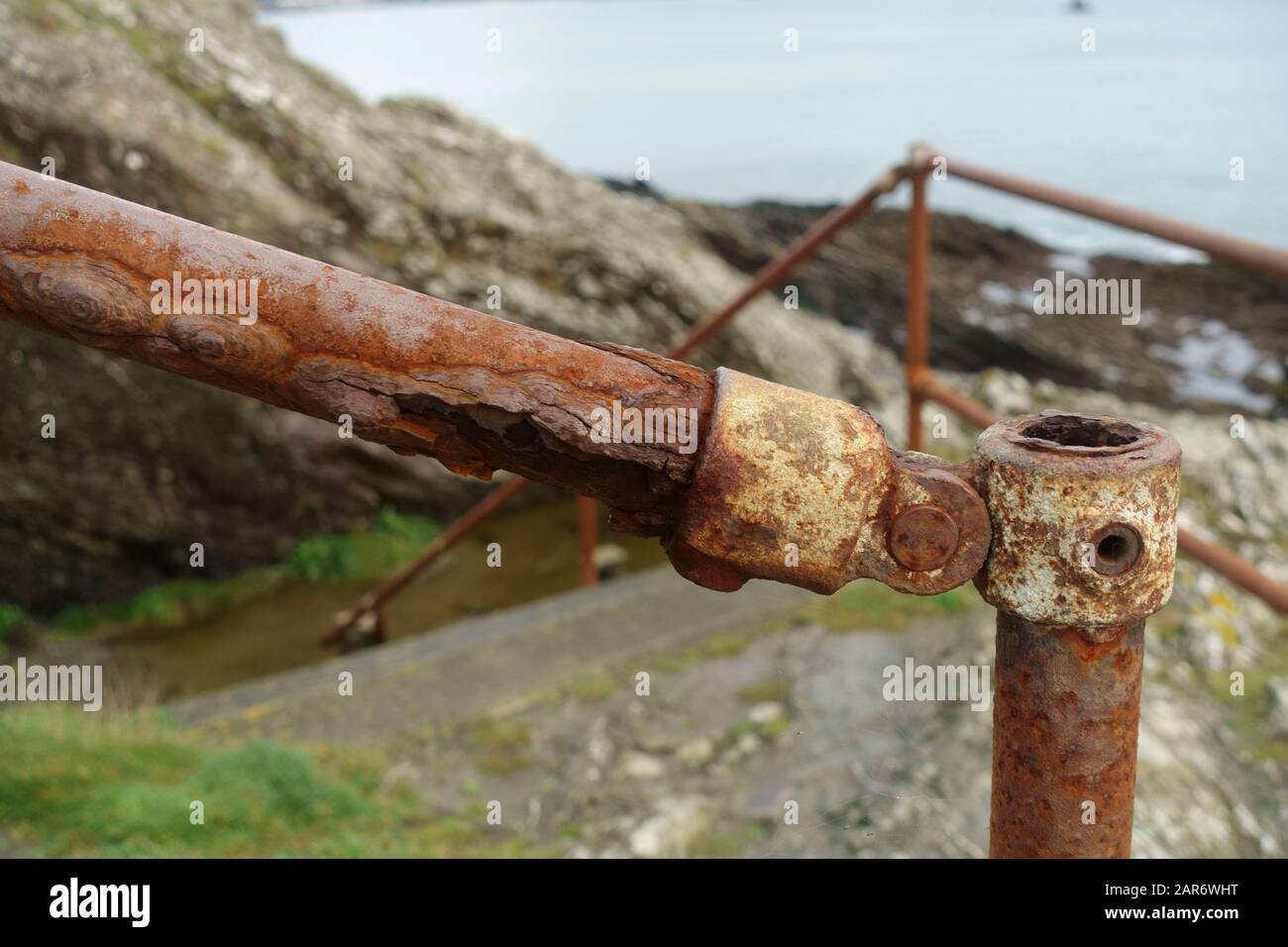 Rusting broken metal handrail, UK Stock Photo - Alamy