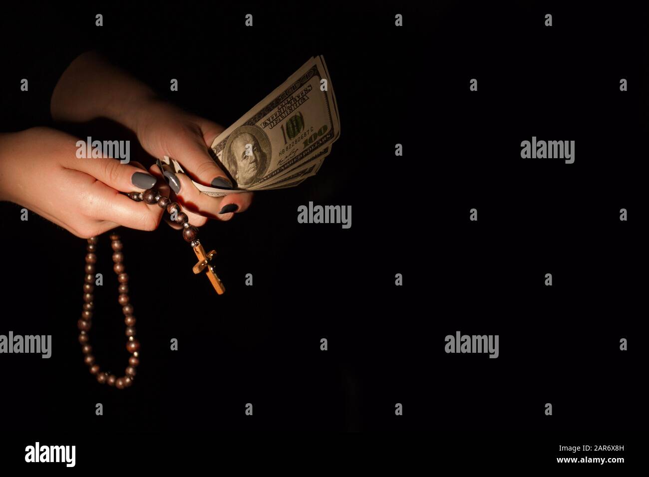 Money and religion concept Stock Photo - Alamy