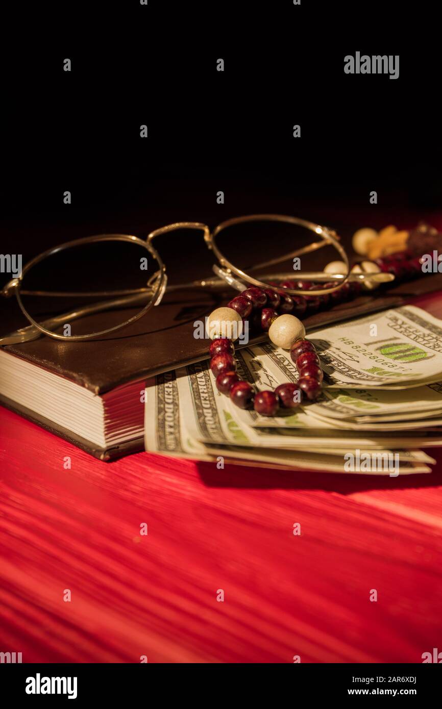 Religion and wealth concept Stock Photo - Alamy