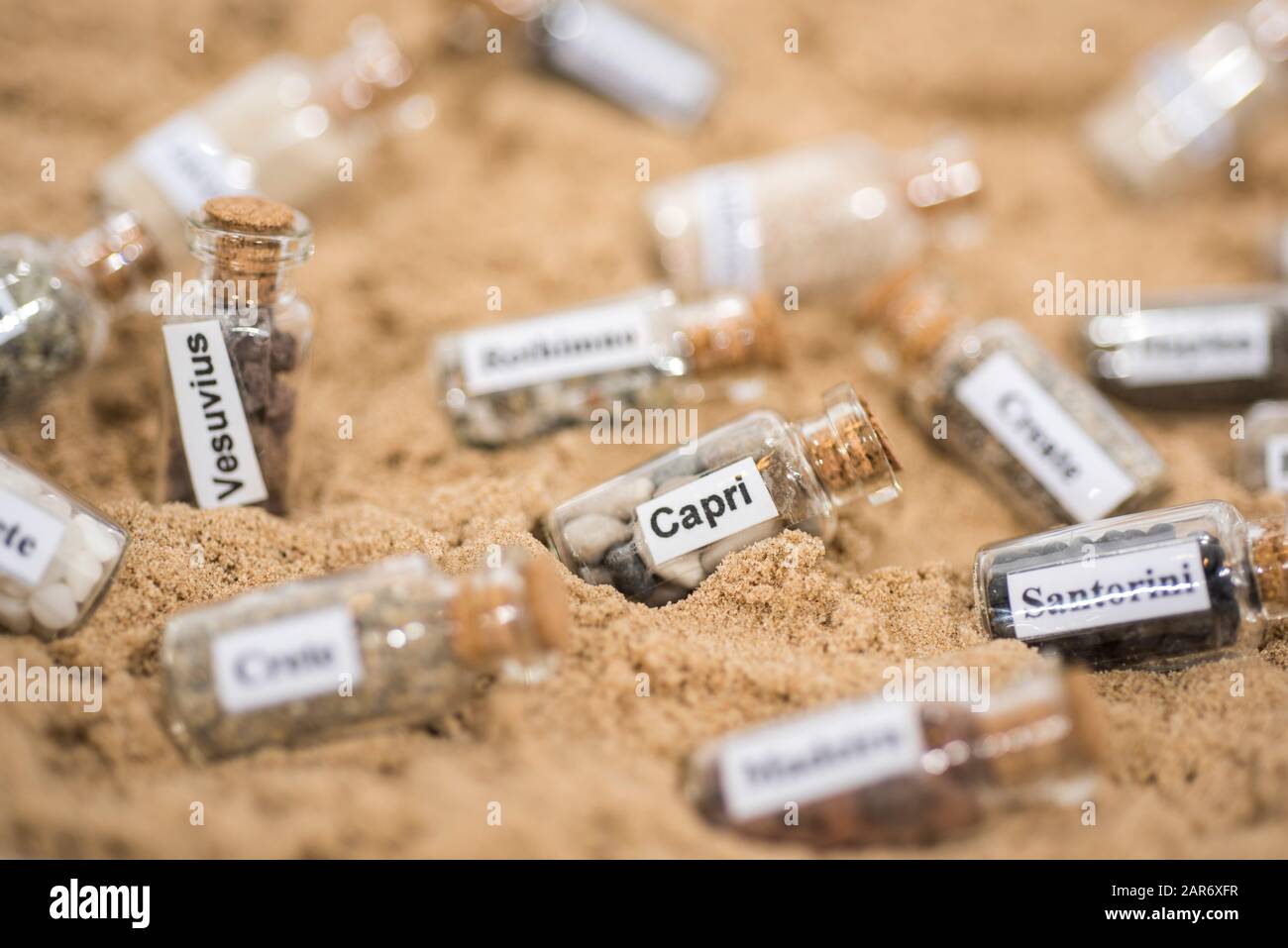 Glass test-tube with sand of different summer vacation countries Stock ...