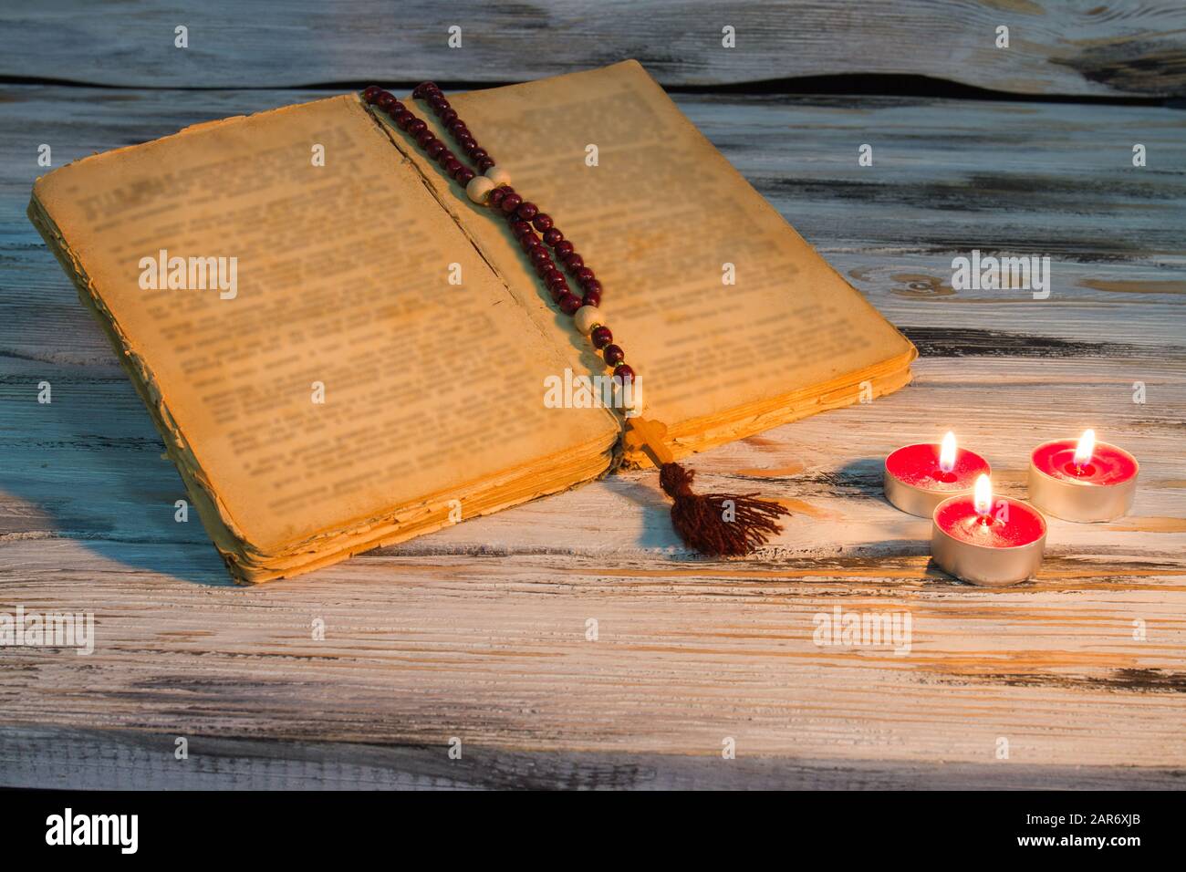 Open bible candles hi-res stock photography and images - Alamy