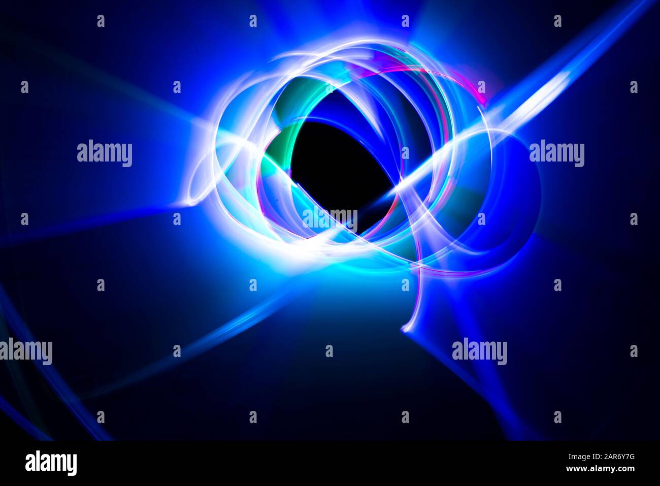 Abstract background with blue color light painting like infinity sign ...