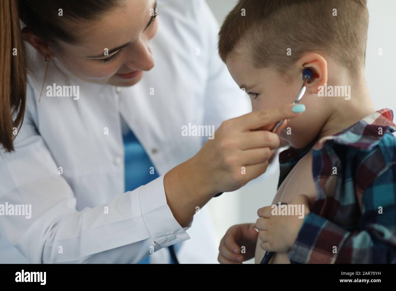 Smiling family doctor Stock Photo - Alamy