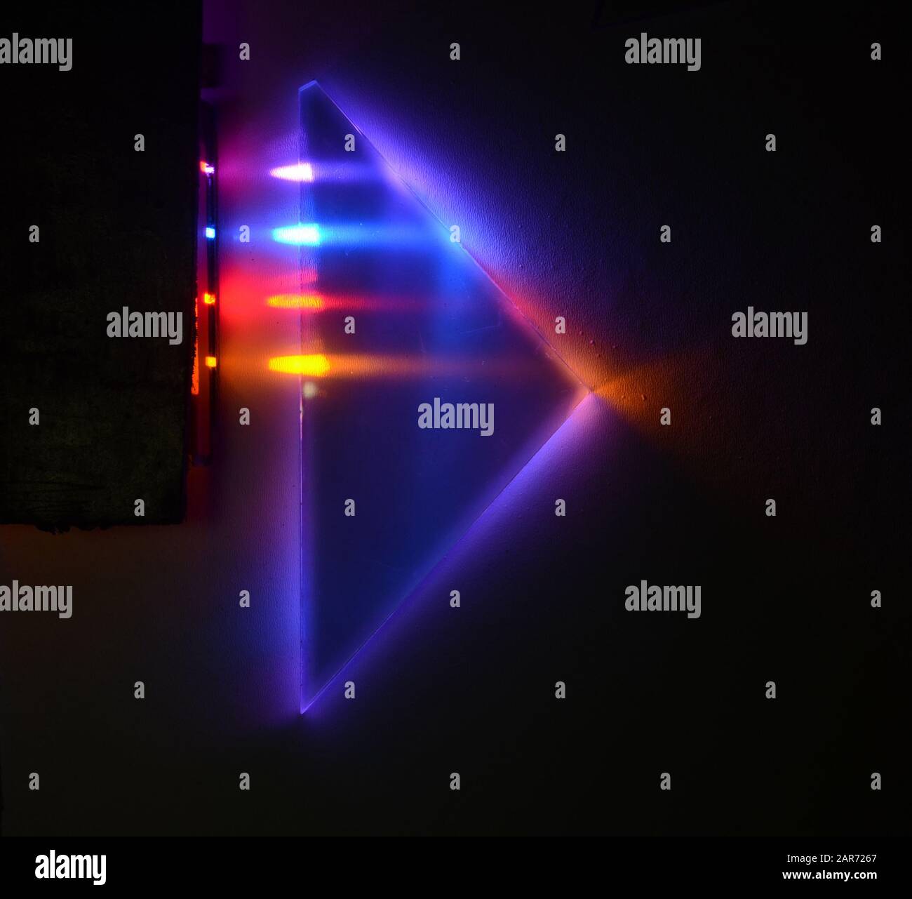 Four different light beams are refracted and mirrored internally a ...