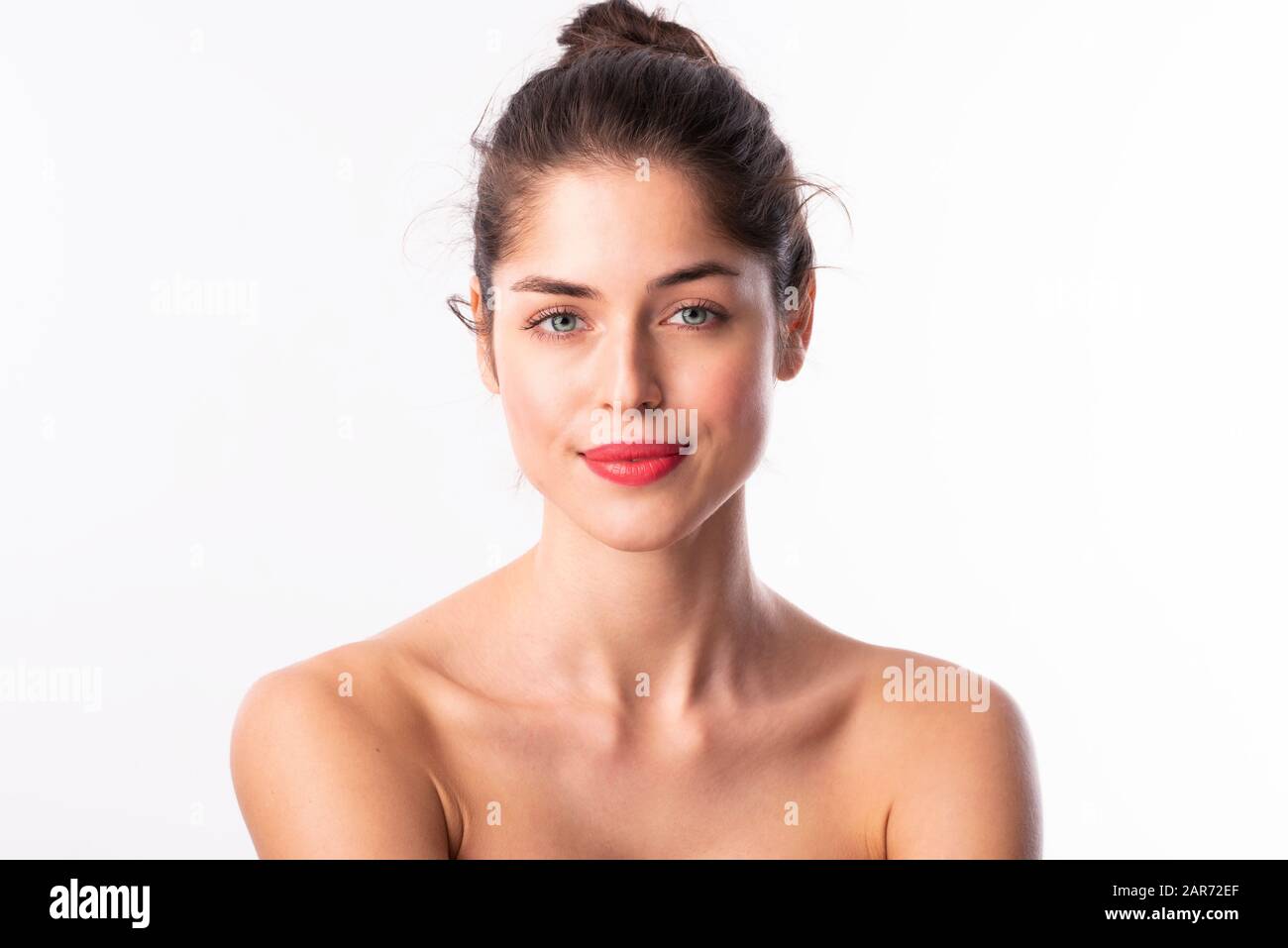 Portrait of gorgeous young woman with perfect skin wearing red lipstick ...