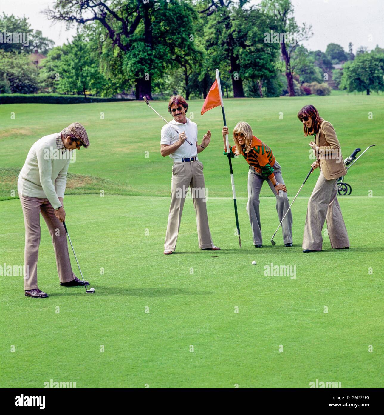 London 1970s, two couples playing golf, Royal Wimbledon Golf Club ...