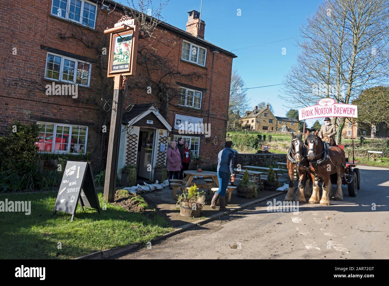 Drayman, Roger Hughes and Erzsebet Csak, a dray delivery assistant ...