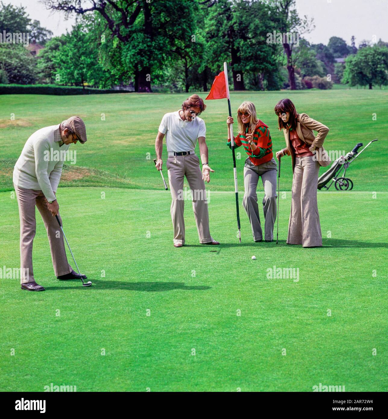 London 1970s, two couples playing golf, Royal Wimbledon Golf Club ...