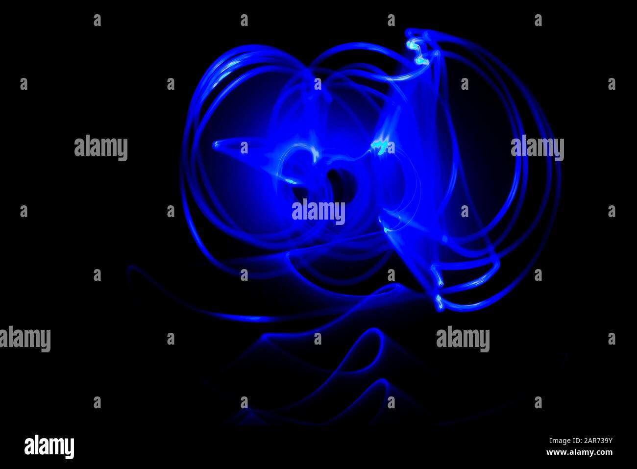 Abstract background with blue color light painting Stock Photo - Alamy