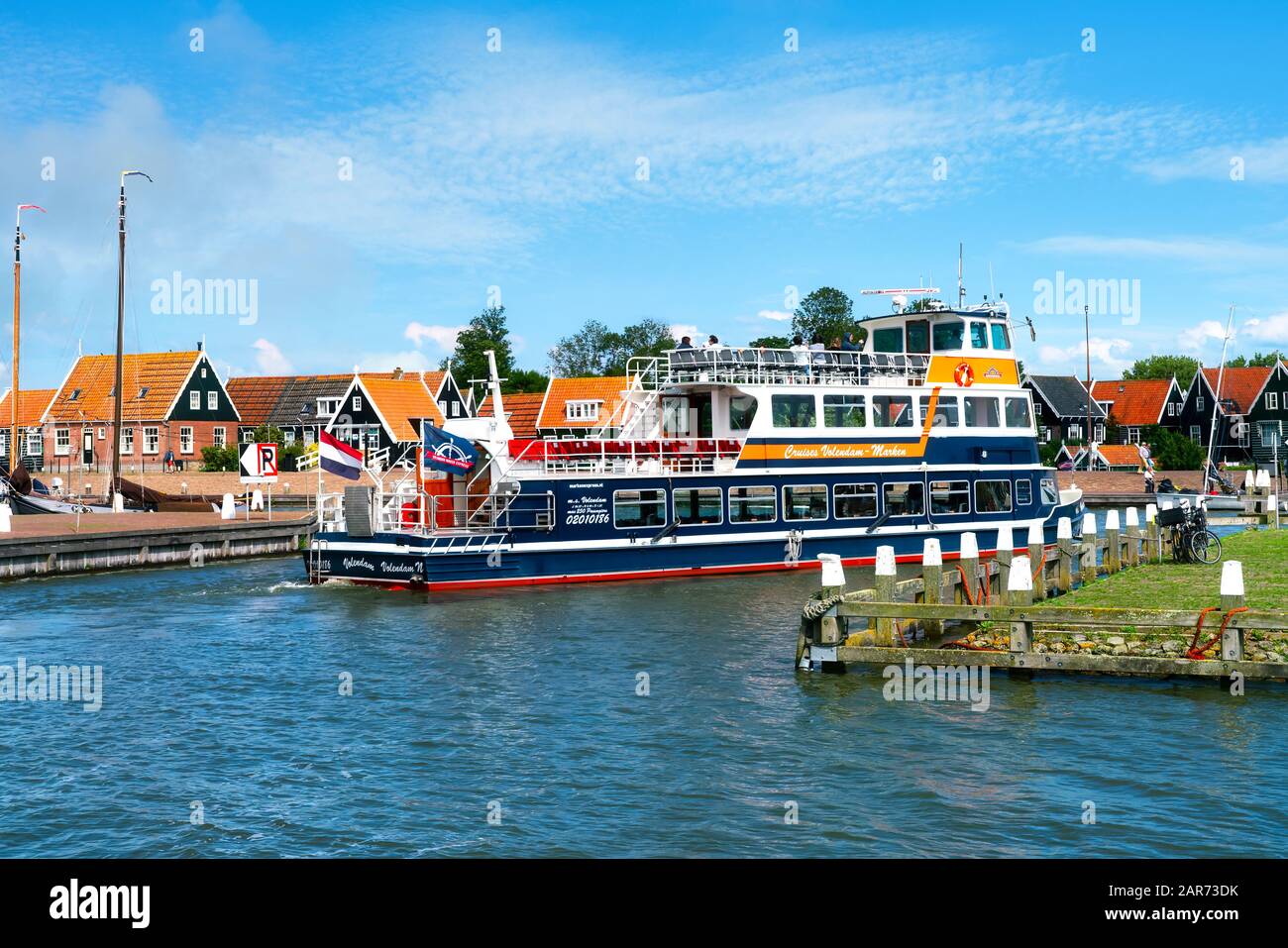 Marken, Netherlands, 06/20/2019: The tourist ferry service between 2 ...