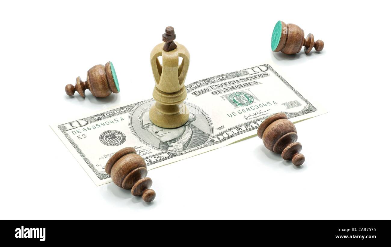 Money Rules: Four Defeated Black Pawn Chess Pieces Lying Around A White ...