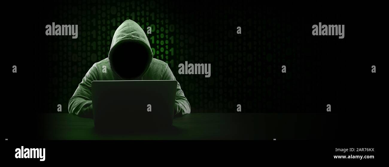 hacker without face in a hood over binary code background, panoramic mock-up with space for text ...