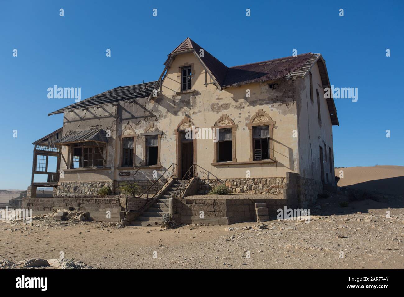 Abandoned and forgotten building and room being taken over by encroaching sandstorm, Kolmanskop ...