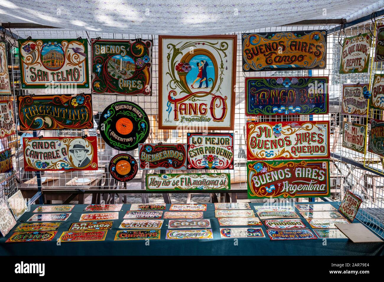 Stall with ancient traditional plaques in the san telmo fair hi-res ...