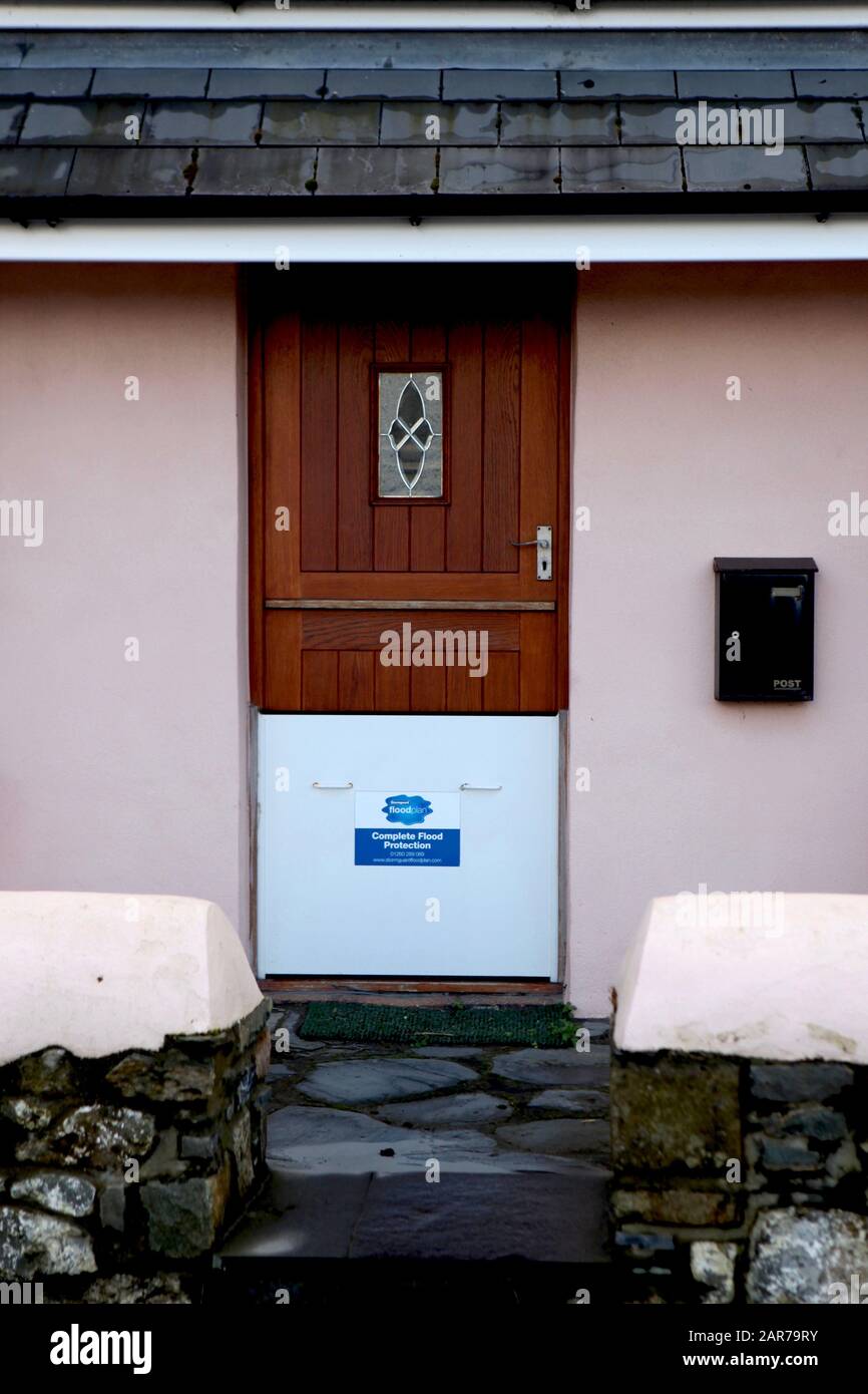 front door with flood defence barrier, Wales Stock Photo - Alamy