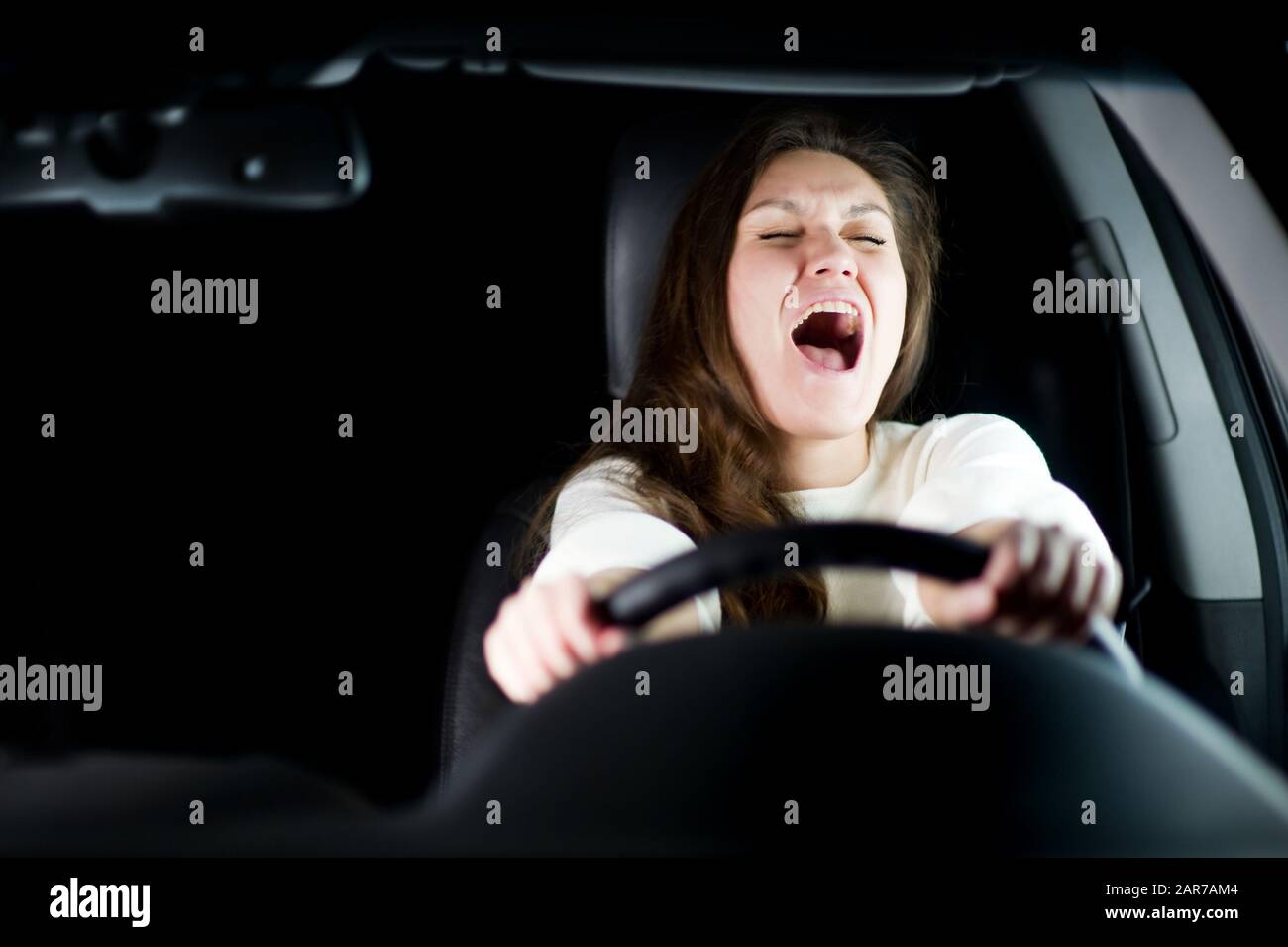 Female driver scared at night hi-res stock photography and images - Alamy