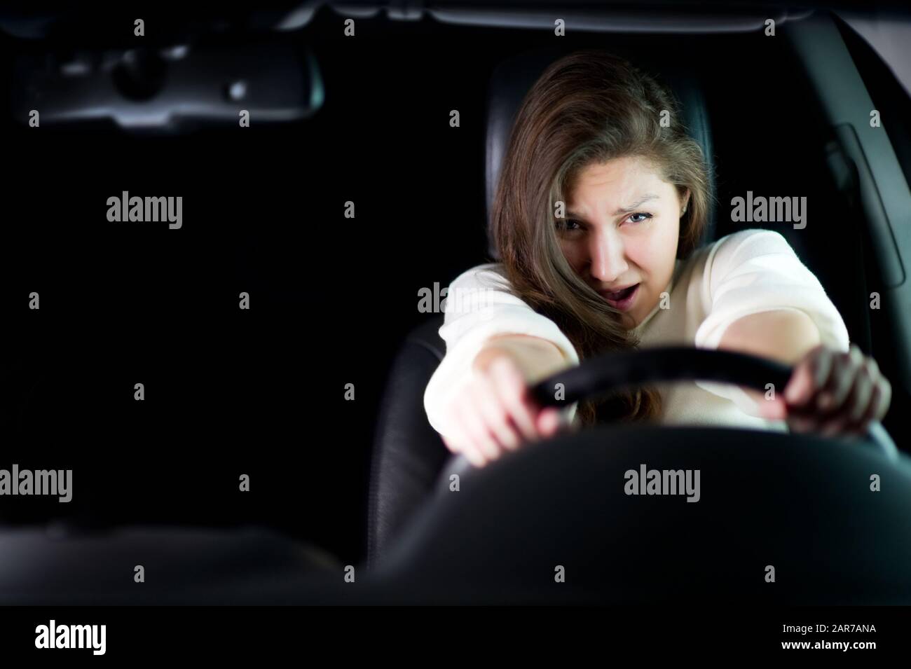 Female driver scared at night hi-res stock photography and images - Alamy
