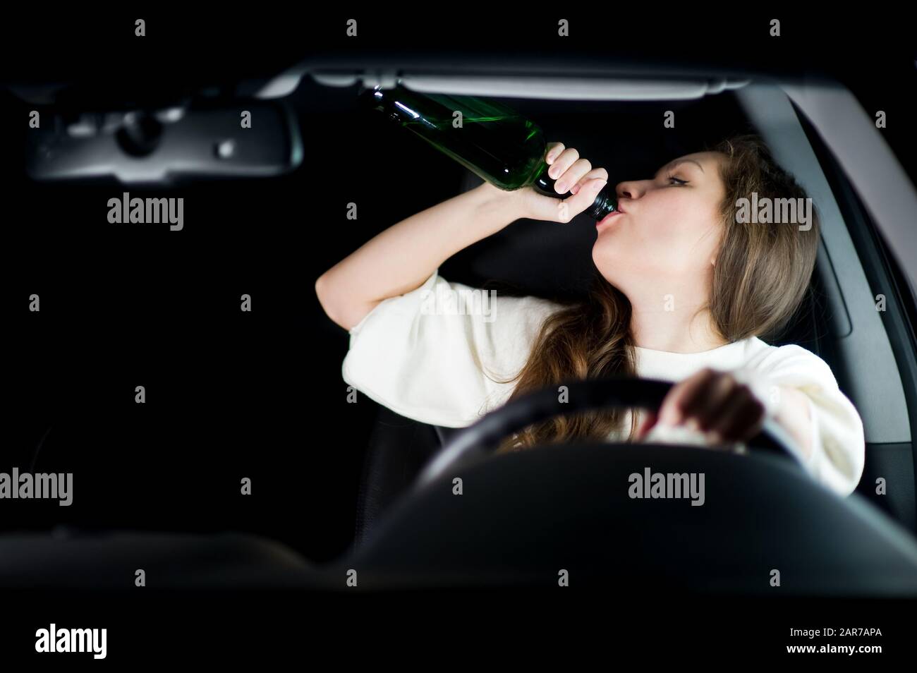 Drunk woman driving car beer hi-res stock photography and images - Alamy