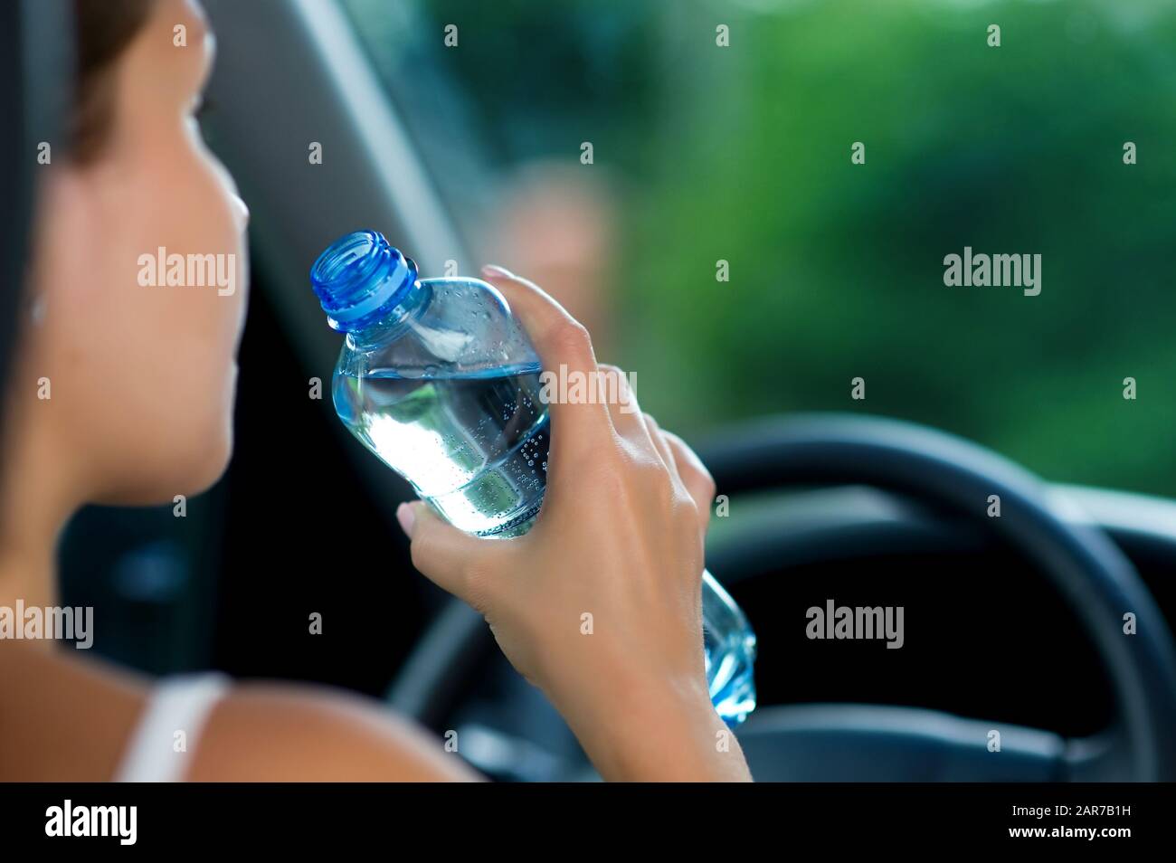 Driver drinking from water bottle hi-res stock photography and images ...