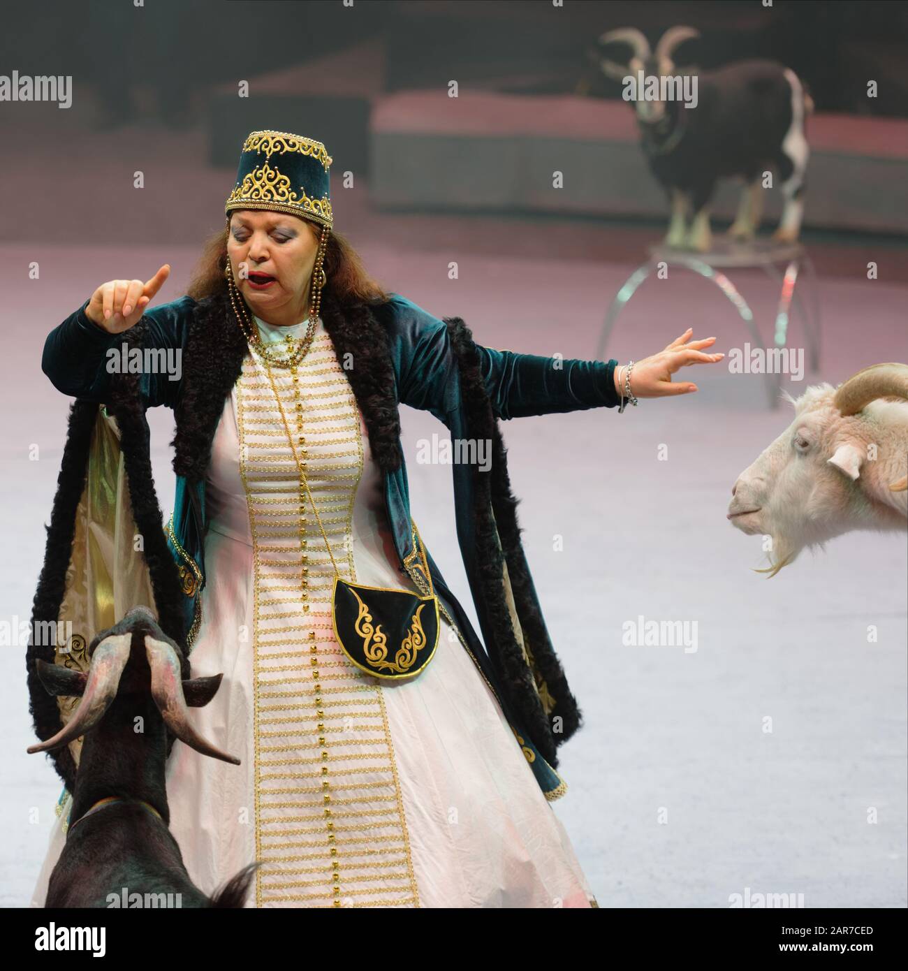 St. Petersburg, Russia - December 27, 2019: Circus actor with trained ...