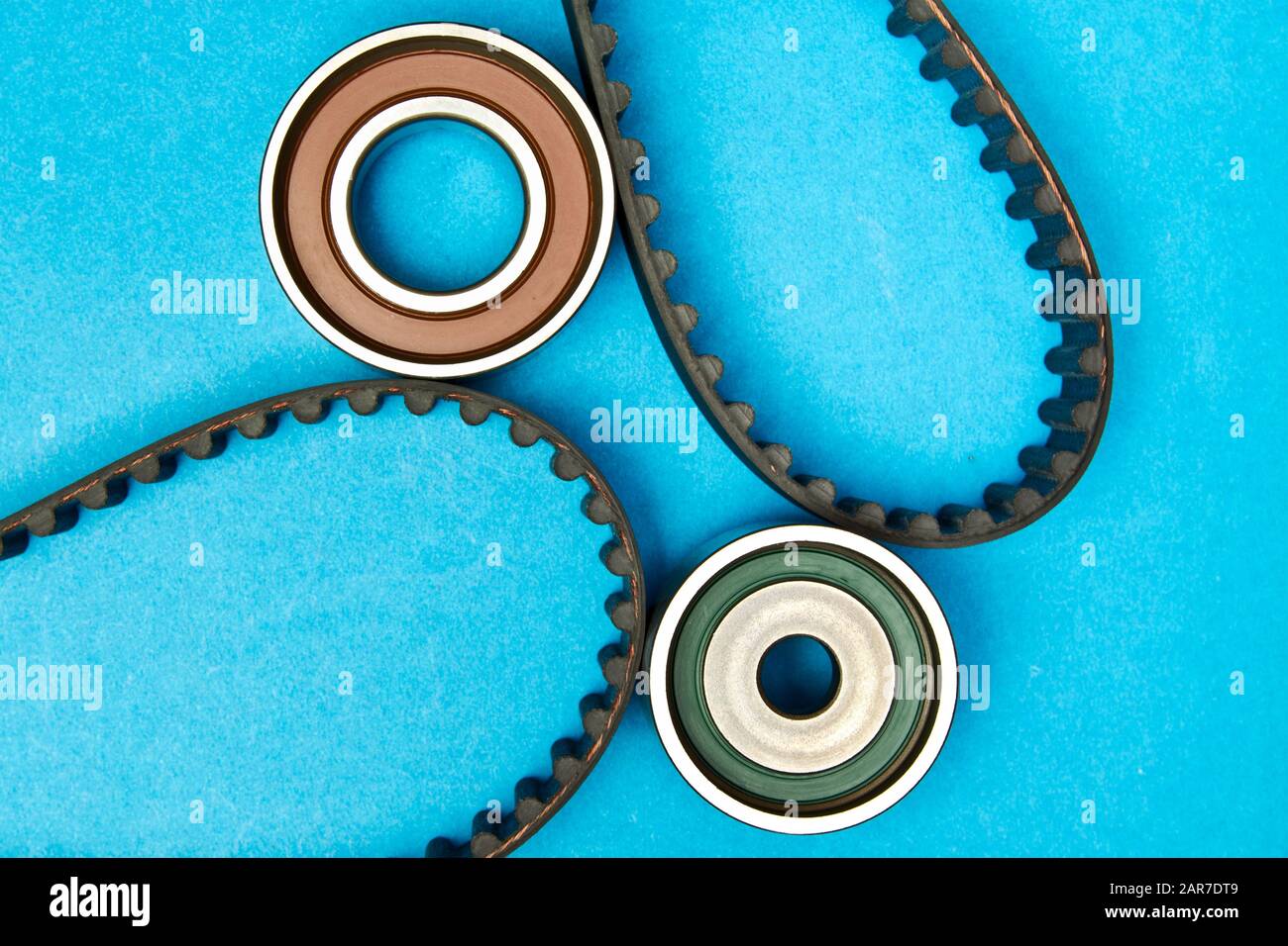 Timing belt with rollers on background .Kit of timing belt for car ...