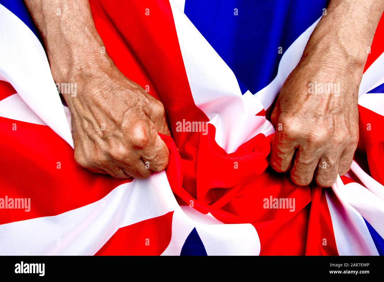 Man holding waving union jack flag hi-res stock photography and images ...