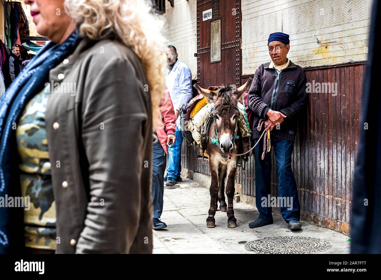 Old man walking in fez old town hi-res stock photography and images - Alamy