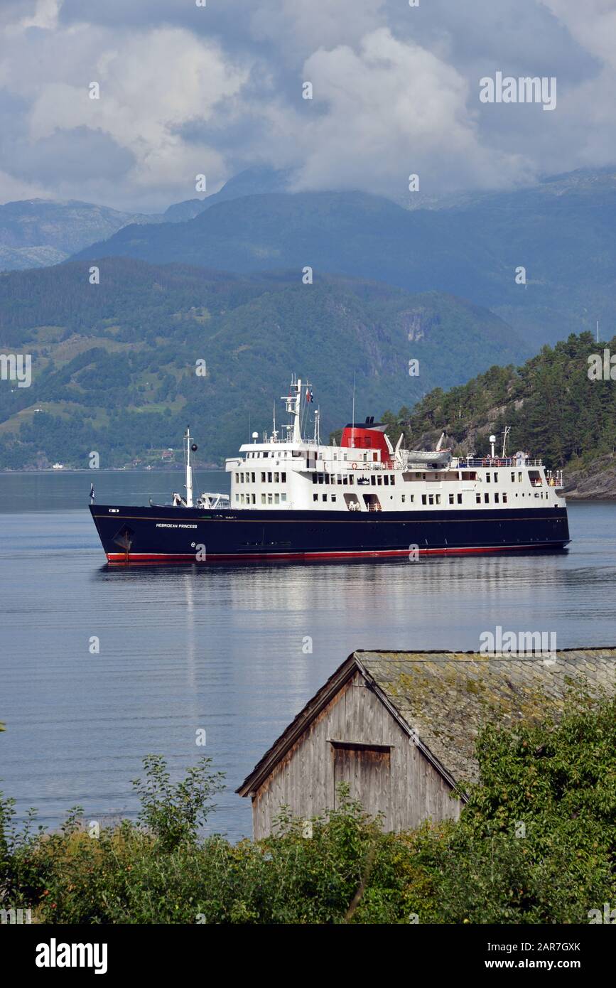 HEBRIDEAN PRINCESS and BOATHOUSE off HERAND, HARDANGERFJORD, NORWAY ...