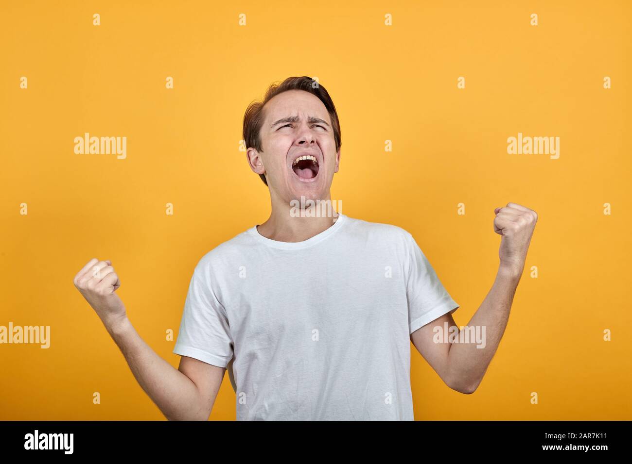 Emotion despair fear rage. Raises his hands in rage screams with his ...