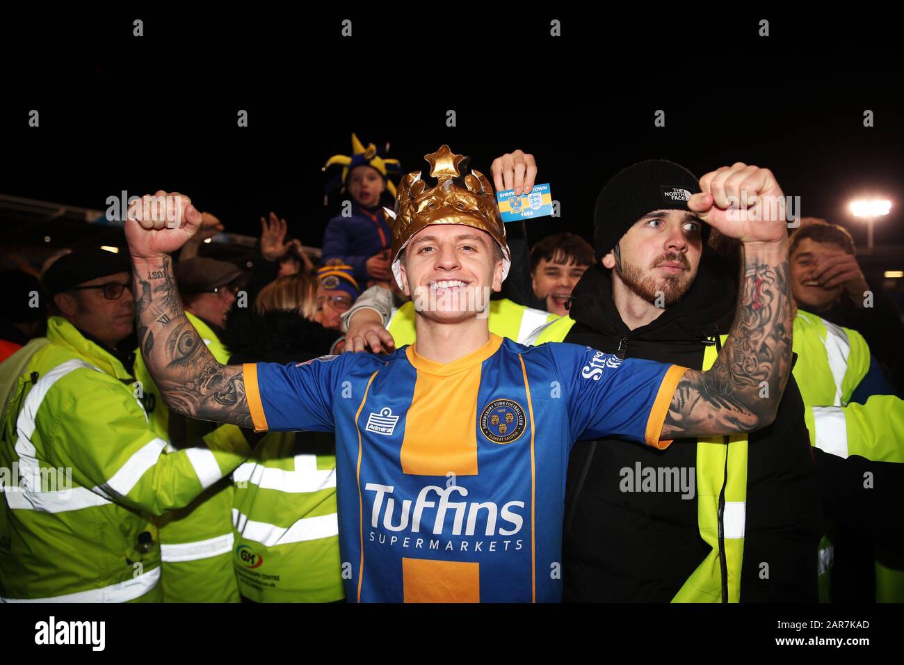 Shrewsbury Town's Jason Cummings at full time as fans invade the pitch ...