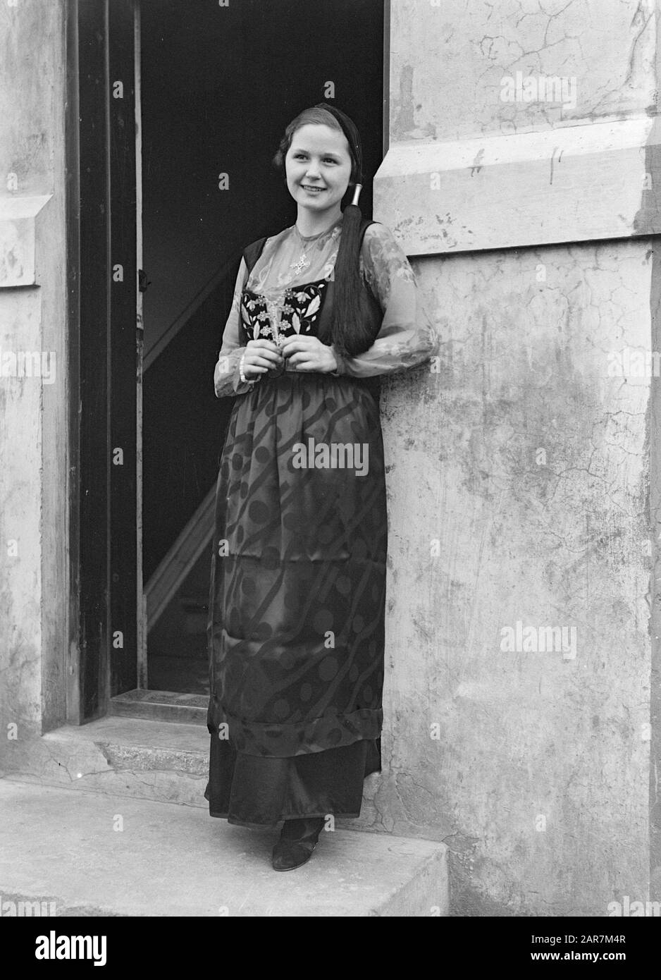 Standing in door frame Black and White Stock Photos & Images - Alamy
